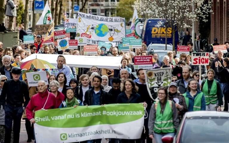 Environmentalists in Europe sue to force Shell to meet Paris accord ...